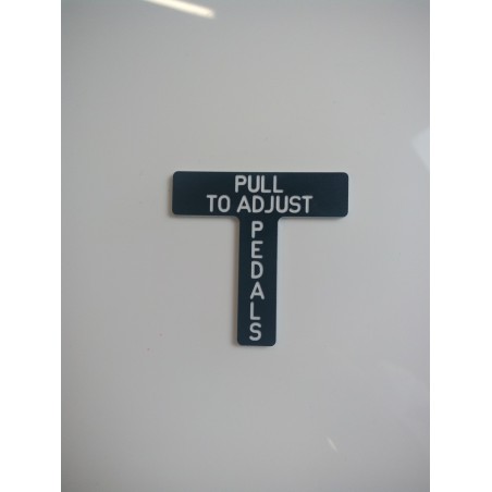 Pull to Adjust rudder sign